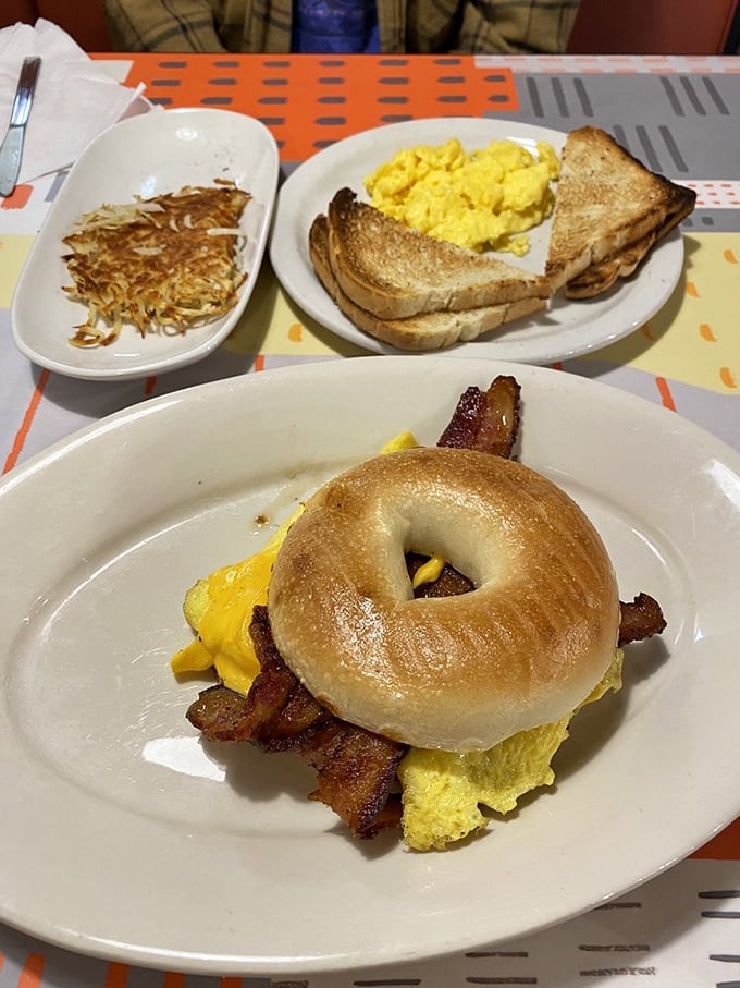 The bagel sandwich—New York's gift to breakfast that found a worthy home in Pennsylvania. Notice how the egg peeks out mischievously.
