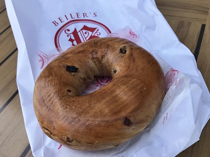 The bagel's often-overlooked cousin at Beiler's still deserves your attention—a chewy canvas of possibility nestled in crisp white paper.