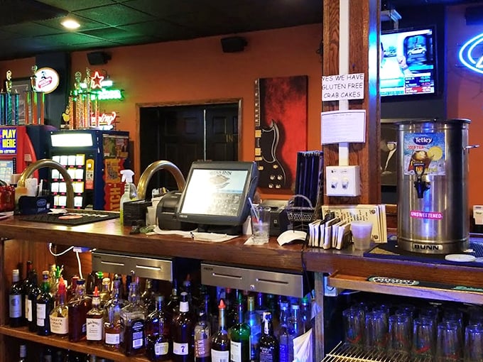 The bar area – where cold beer flows, sports play on TV, and strangers become friends over shared love of Maryland's bounty.
