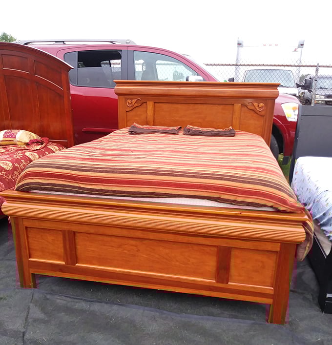 Bedroom furniture with stories to tell, priced so reasonably you'll have money left for the matching nightstands hiding three rows over.