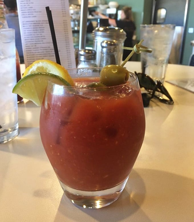 Their Bloody Mary doesn't just come with a garnish—it arrives with an entire ecosystem of citrus, olive, and spice in a glass.
