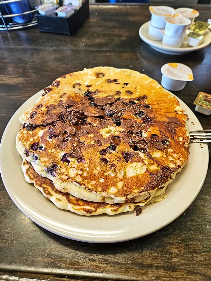 These blueberry pancakes aren't just breakfast, they're edible sunshine – perfectly golden with bursts of berry in every magnificent bite.