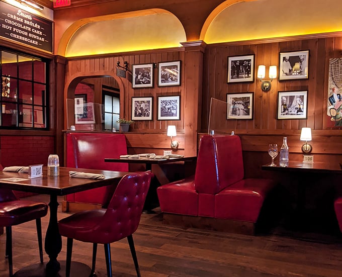 Those red booths aren't just seating—they're front-row tickets to the best show in town: dinner at The Avenue.