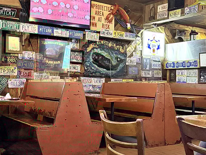 The walls aren't just decorated, they're documented with license plates from every corner of America – a road trip in restaurant form.