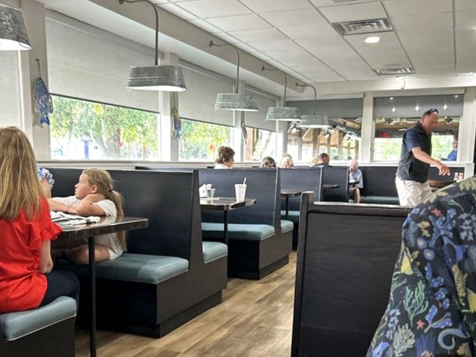 Booth seating that invites you to settle in and stay awhile. These aren't "turn the tables quickly" booths—they're "order dessert and maybe another round" booths.