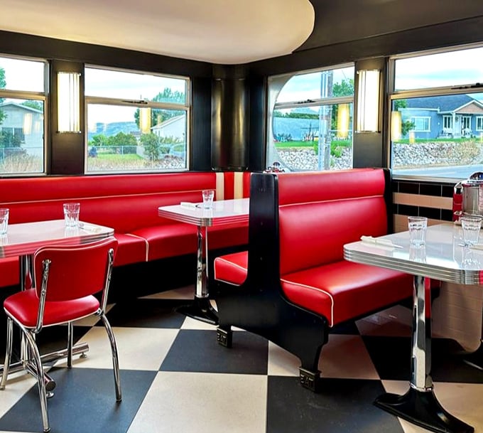 These booths aren't just seating—they're private dining rooms where memories are made between bites of comfort food classics.