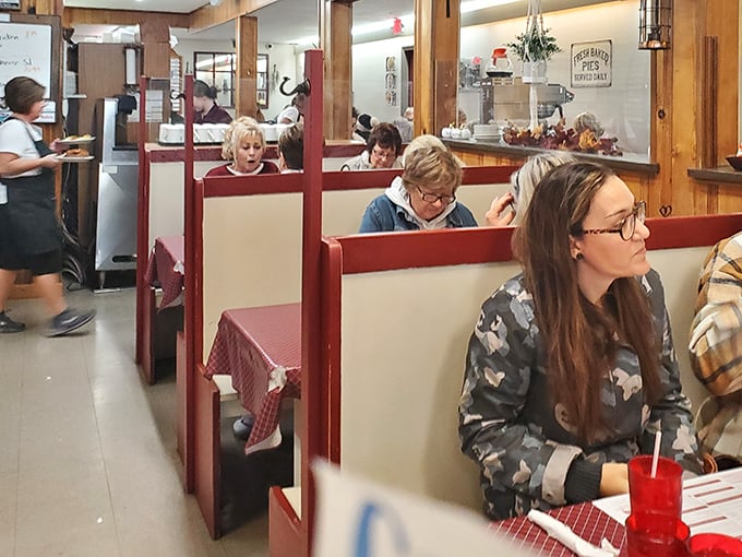 Red-checkered tablecloths and booth dividers—the classic diner uniform that signals you're about to eat something wonderful.