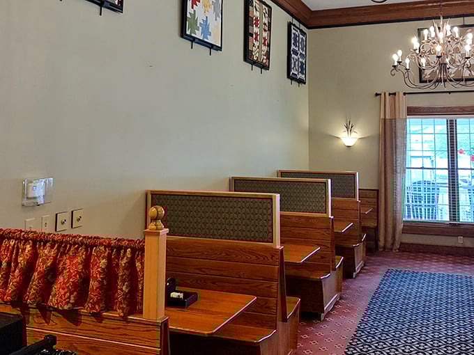 Cozy booth seating where families gather to create memories over plates piled high with comfort food classics.