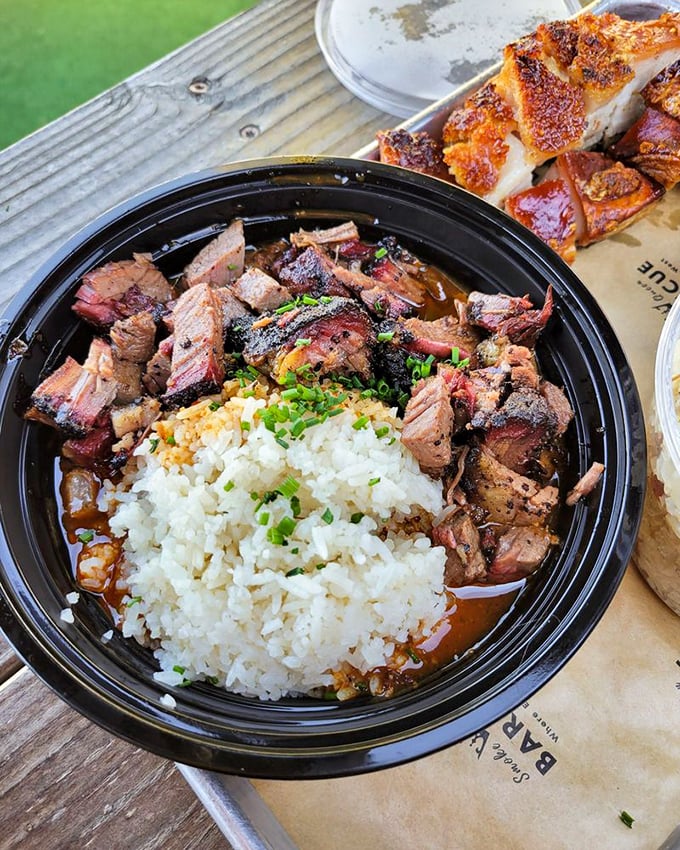 Brisket and rice—a marriage made in culinary heaven. Those green onions aren't just garnish; they're the confetti at this flavor party.