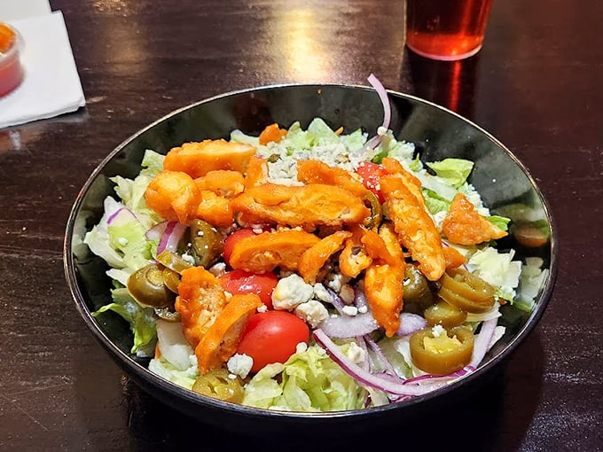 Buffalo chicken salad that breaks the rules—spicy chicken chunks command attention atop crisp greens, proving salads don't have to be boring.