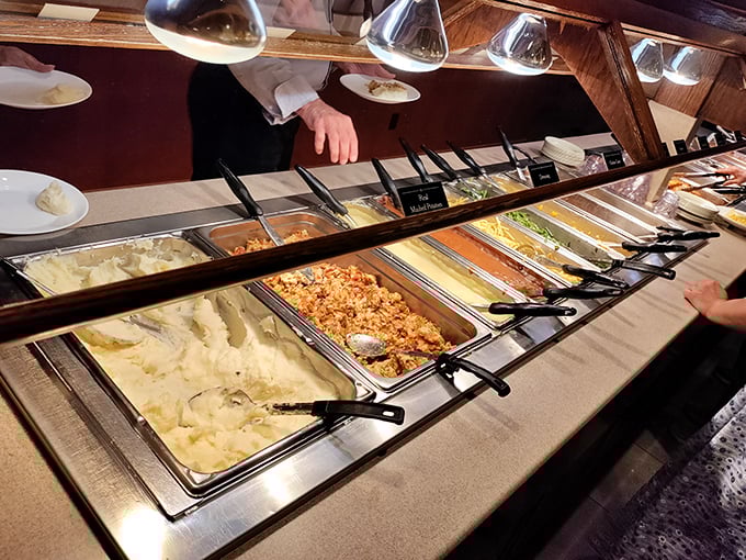 The buffet line—where the mashed potatoes reign supreme and portion control becomes merely a suggestion rather than a rule.