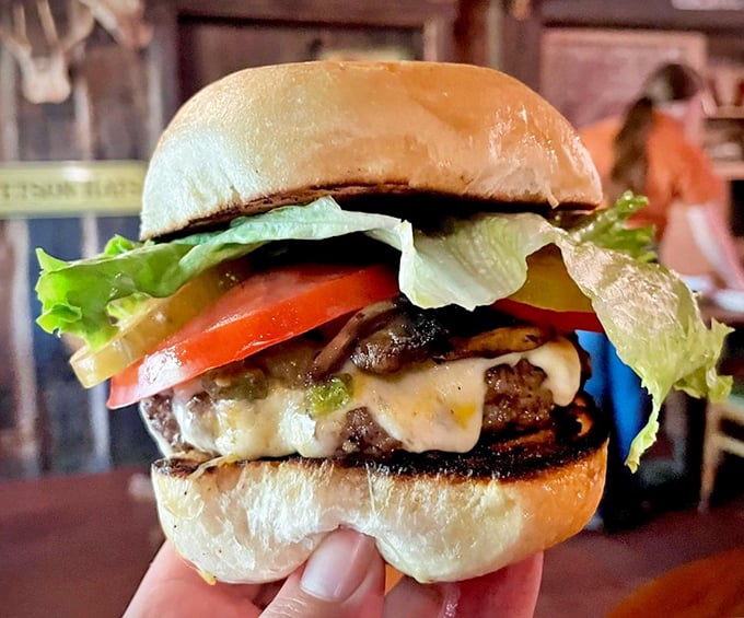 The famous Ranch Burger – a hand-formed patty topped with melty cheese and fresh veggies that makes fast food chains weep with inadequacy.