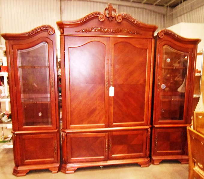 This entertainment center isn't just furniture—it's a time machine to when TVs were deeper than they were wide.