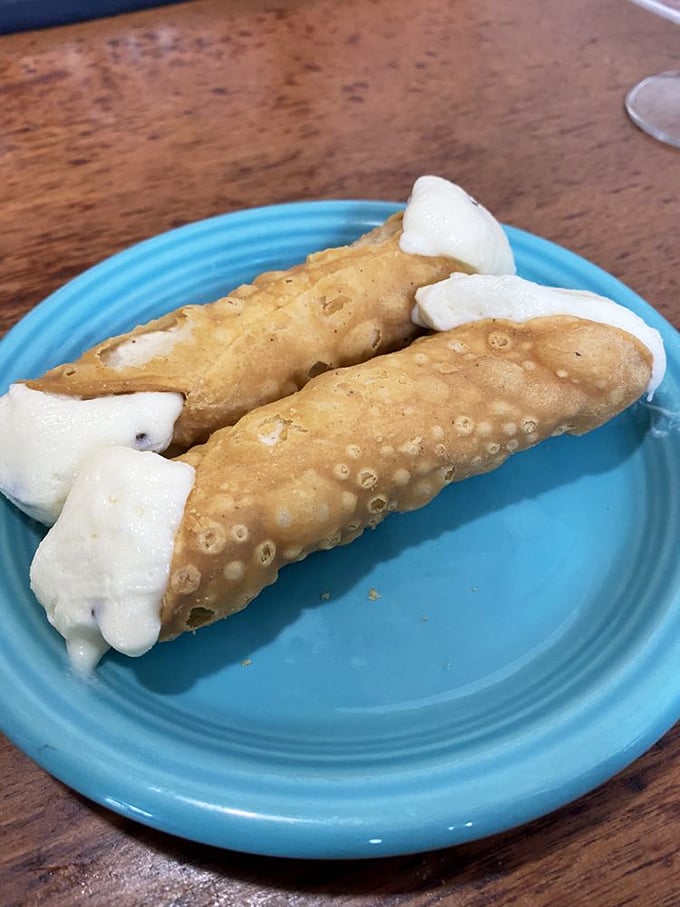 Cannoli that would make even the Godfather put business aside for a moment—crisp shells giving way to creamy, sweet ricotta filling.