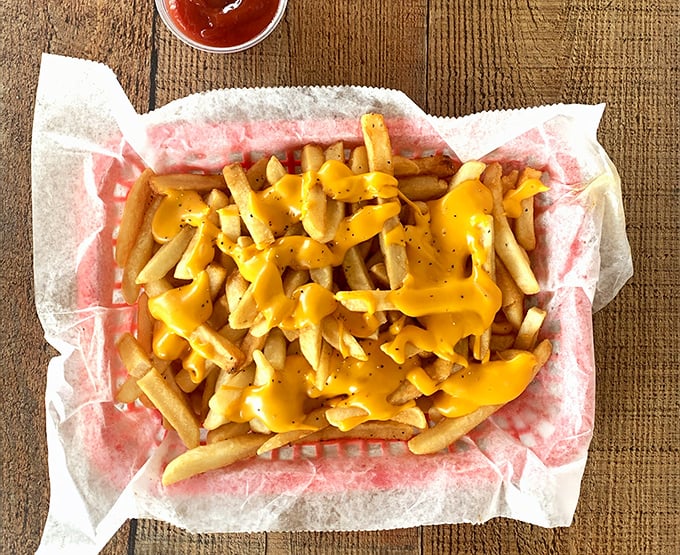 Cheese fries that make you question all your life choices—in the best possible way. That golden cascade of cheese sauce is pure Pennsylvania poetry.