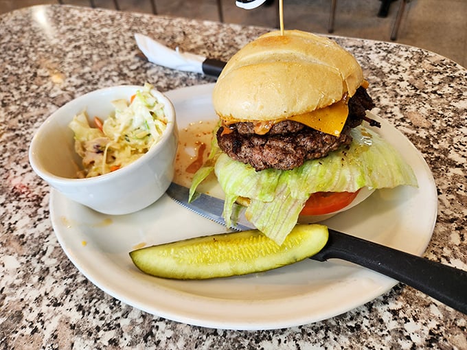 This isn't just a cheeseburger—it's a hand-formed masterpiece of beef, cheese, and fresh toppings that makes fast food weep with inadequacy.