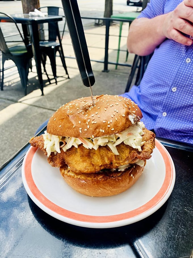 This chicken sandwich isn't just food—it's architecture. Crispy breading, pillowy bun, and slaw stacked with the precision of a master builder.