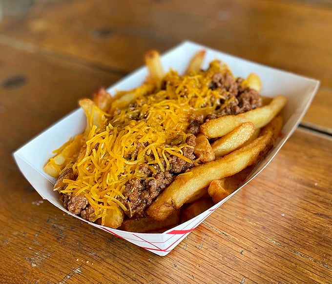 These aren't just chili cheese fries—they're a comfort food conspiracy between potatoes, beef, and cheese to make you forget your diet.