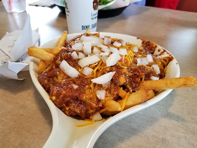 Chili cheese fries – where comfort food meets excess in the most beautiful way. A fork is suggested but fingers are understood.