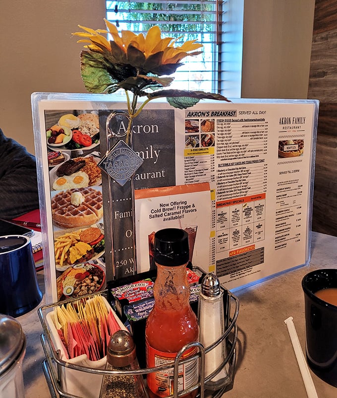 Every condiment caddy tells a story—this one speaks of meals enhanced by hot sauce, sweetened by jelly packets, and seasoned to perfection.