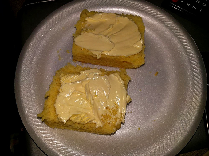 Cornbread with a slather of butter—the supporting actor that occasionally steals the scene from the barbecue stars. Sweet, crumbly perfection.