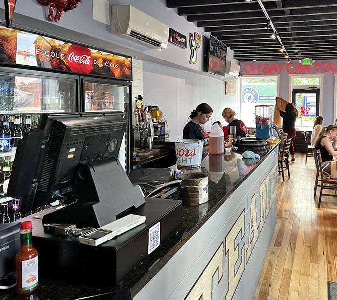 The counter where seafood dreams come true—simple, efficient, and focused on getting those steamed treasures to your table.