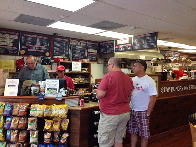 The counter—where hopes are raised, orders are placed, and dietary resolutions come to die a glorious death.