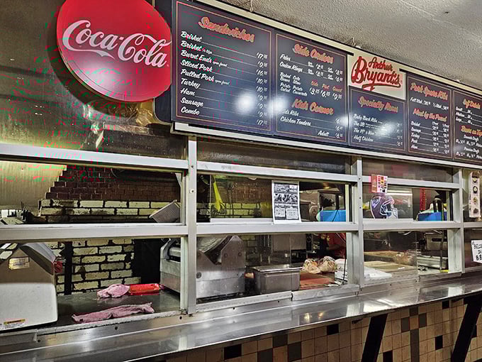 Behind this counter, barbecue magic happens daily—where smoke-ringed meat meets sauce in a dance as old as Kansas City itself.
