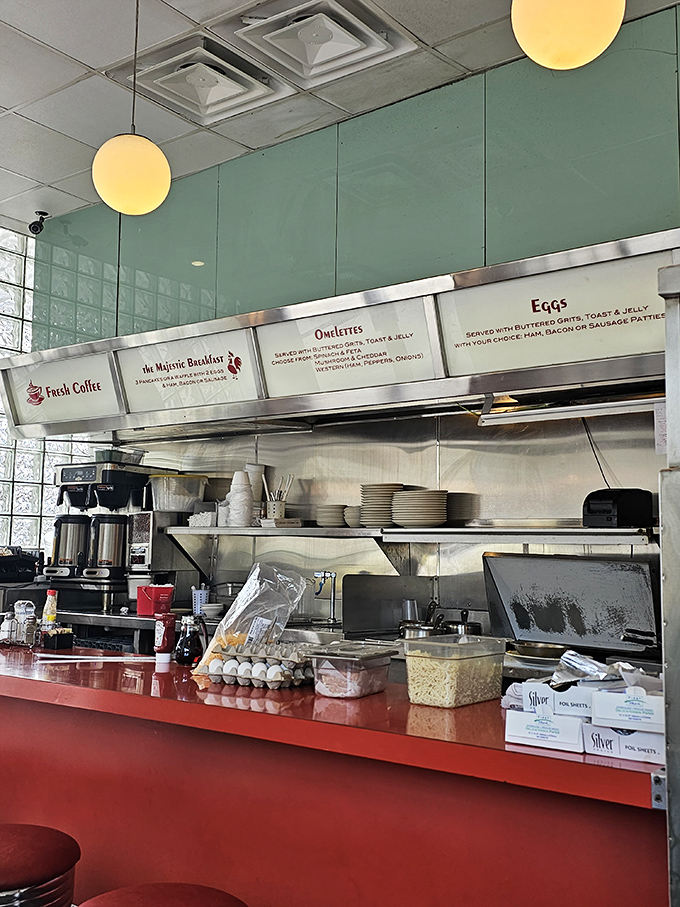 Behind the counter magic happens with military precision—eggs crack, pancakes flip, and somehow your order arrives exactly when you need it most.