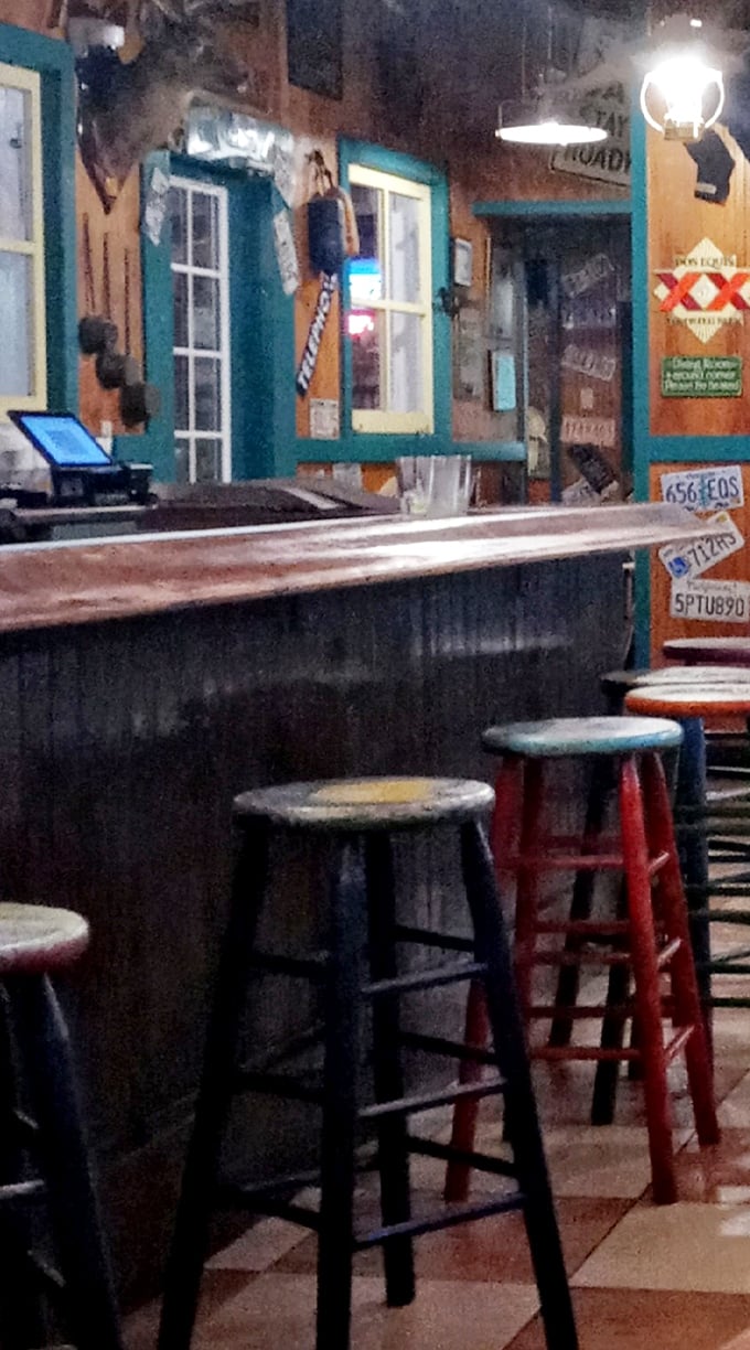 Where every stool has a story. This rustic bar area isn't just seating—it's where countless seafood celebrations have unfolded.