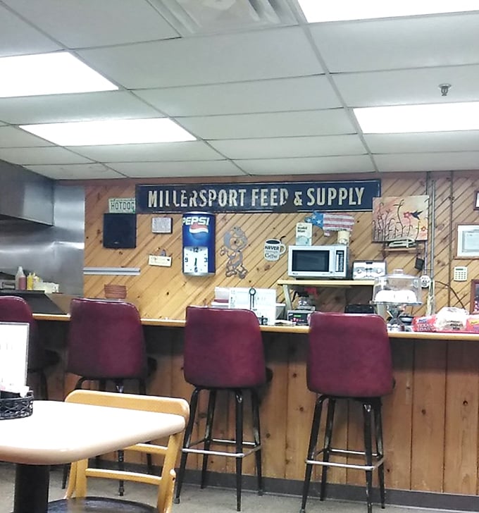 Counter seating – where solo diners become temporary neighbors and the rhythm of small-town life plays out over coffee and conversation.