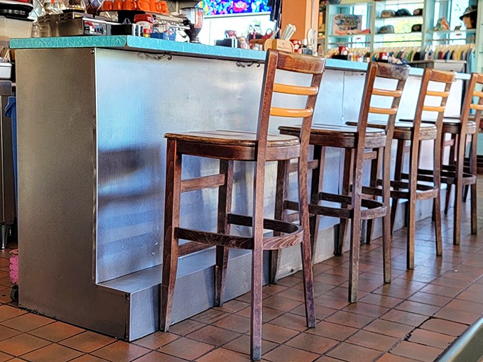 The counter seats – where solo diners become temporary locals and all the best diner gossip is exchanged over bottomless coffee.