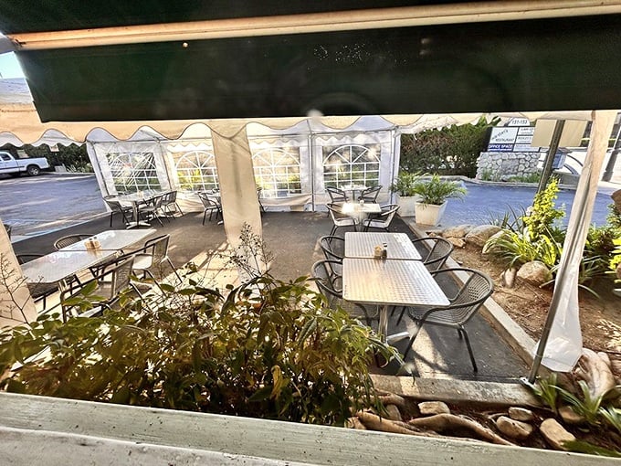 The covered patio offers al fresco dining with protection from both sun and judgment about ordering that second mimosa.