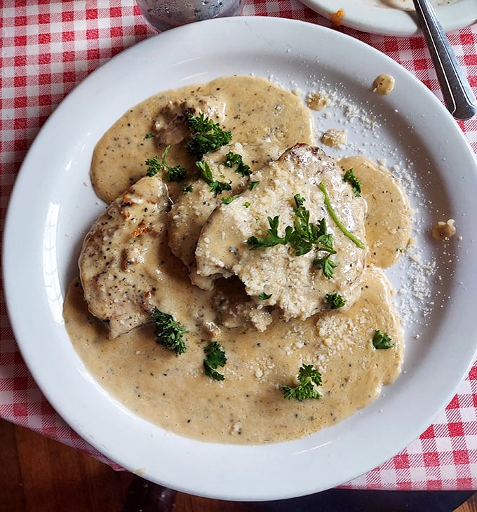 Creamy chicken that's practically floating in sauce so rich it should have its own tax bracket—comfort food that comforts to the core.