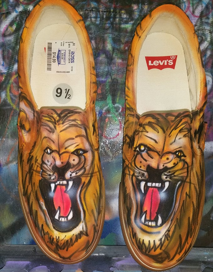 These tiger-faced slip-ons aren't just shoes—they're conversation starters that roar "my personality extends all the way to my feet."