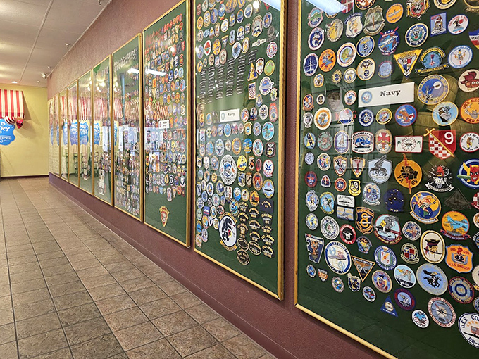 Military patches displayed with pride—a quiet reminder that in Branson, patriotism is always on the menu alongside the comfort food.