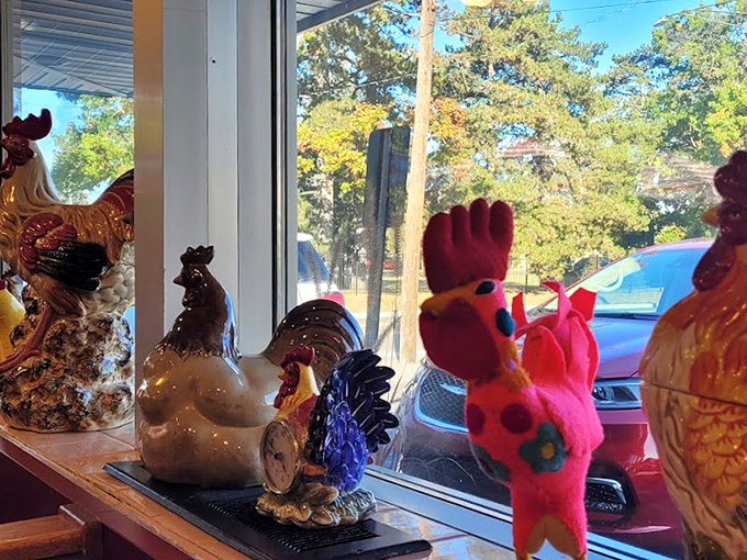 The rooster collection watching over diners – silent guardians ensuring your breakfast experience is egg-ceptional in every way.