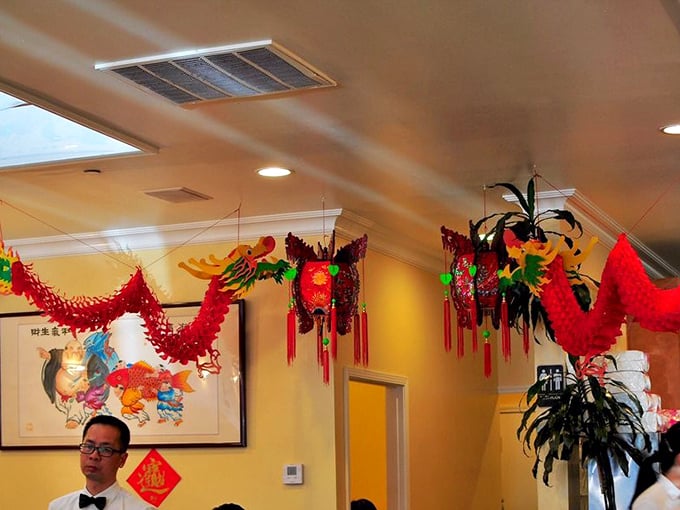 Festive Chinese decorations add splashes of color overhead while diners below focus on the real artwork – what's on their plates.