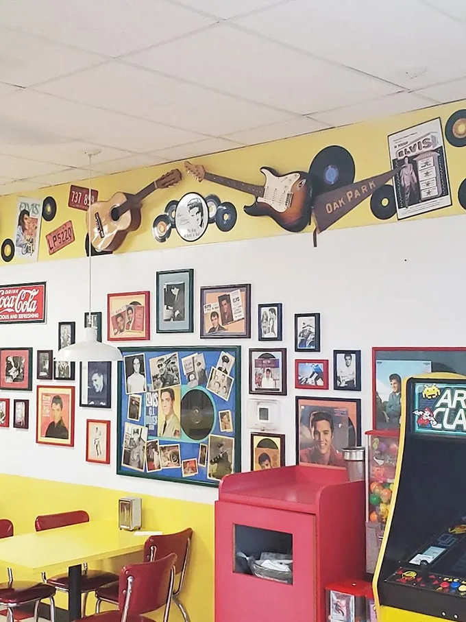 Racing memorabilia meets music history on these walls—a visual feast that gives you something to ponder between bites.