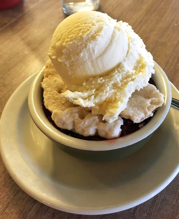 Ice cream atop what appears to be cobbler—proof that dessert doesn't need to deconstruct anything to be magnificent. Just honest sweetness.