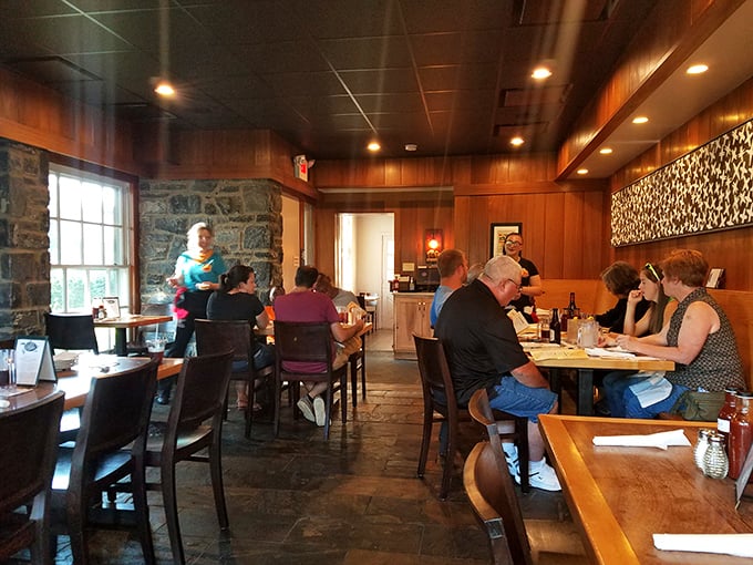 A dining room filled with people who know the secret: sometimes the best meals happen in the most unassuming places.
