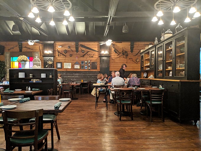 The dining room welcomes patrons with warm wood, vintage tools as décor, and the promise of meals worth lingering over.