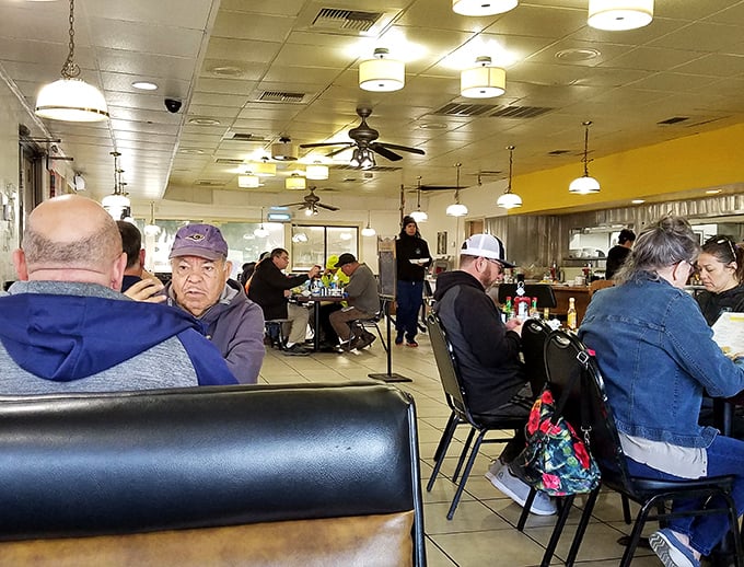 The true measure of a great breakfast spot isn't just the food—it's the cross-section of humanity that gathers there, united by hunger and hope. 