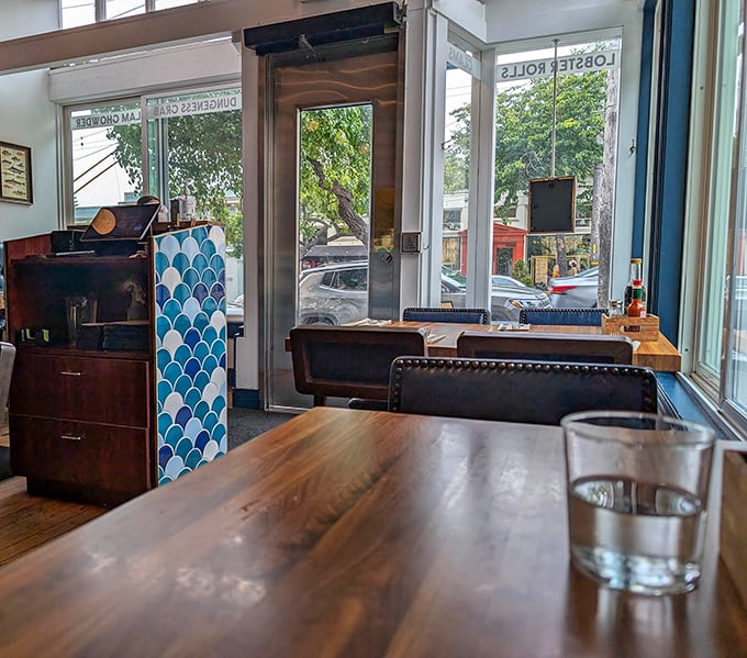 Wooden tables, comfortable seating, and a view to the outside world—the dining area balances coziness with just enough people-watching opportunity.
