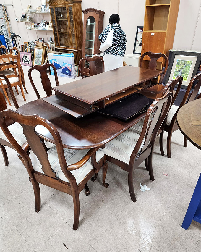This dining table has hosted countless family meals and is ready for yours—solid wood craftsmanship that's outlasted several furniture trends.
