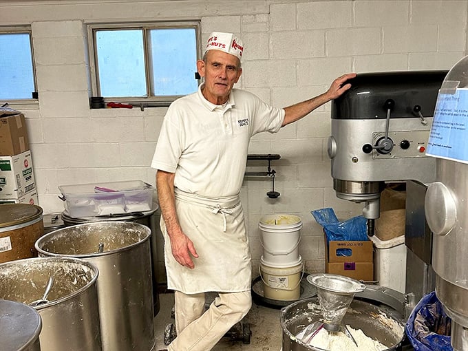 The maestro and his mixer—where every batch begins its journey from humble ingredients to hometown legend.