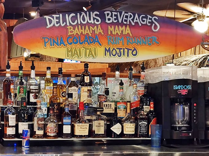 That surfboard sign isn't lying—these tropical concoctions are indeed delicious. The rum selection alone deserves its own zip code.