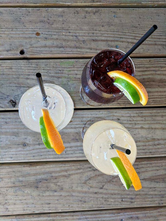 Cocktails arranged like old friends catching up. That citrus garnish isn't just decoration—it's an exclamation point on liquid happiness.