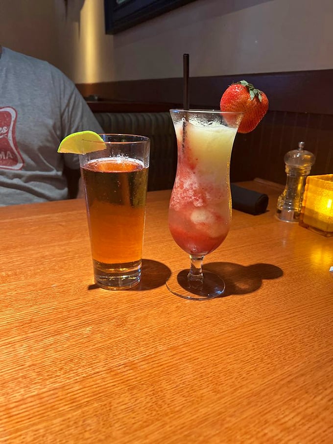 
Cocktails that look as good as they taste—a refreshing prelude to seafood delights. That strawberry garnish isn't just pretty—it's practically a serving of fruit. 