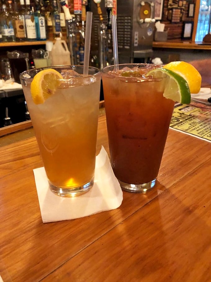 These aren't just drinks—they're the perfect palate cleansers between bites of smoky perfection. The citrus garnish is showing off.